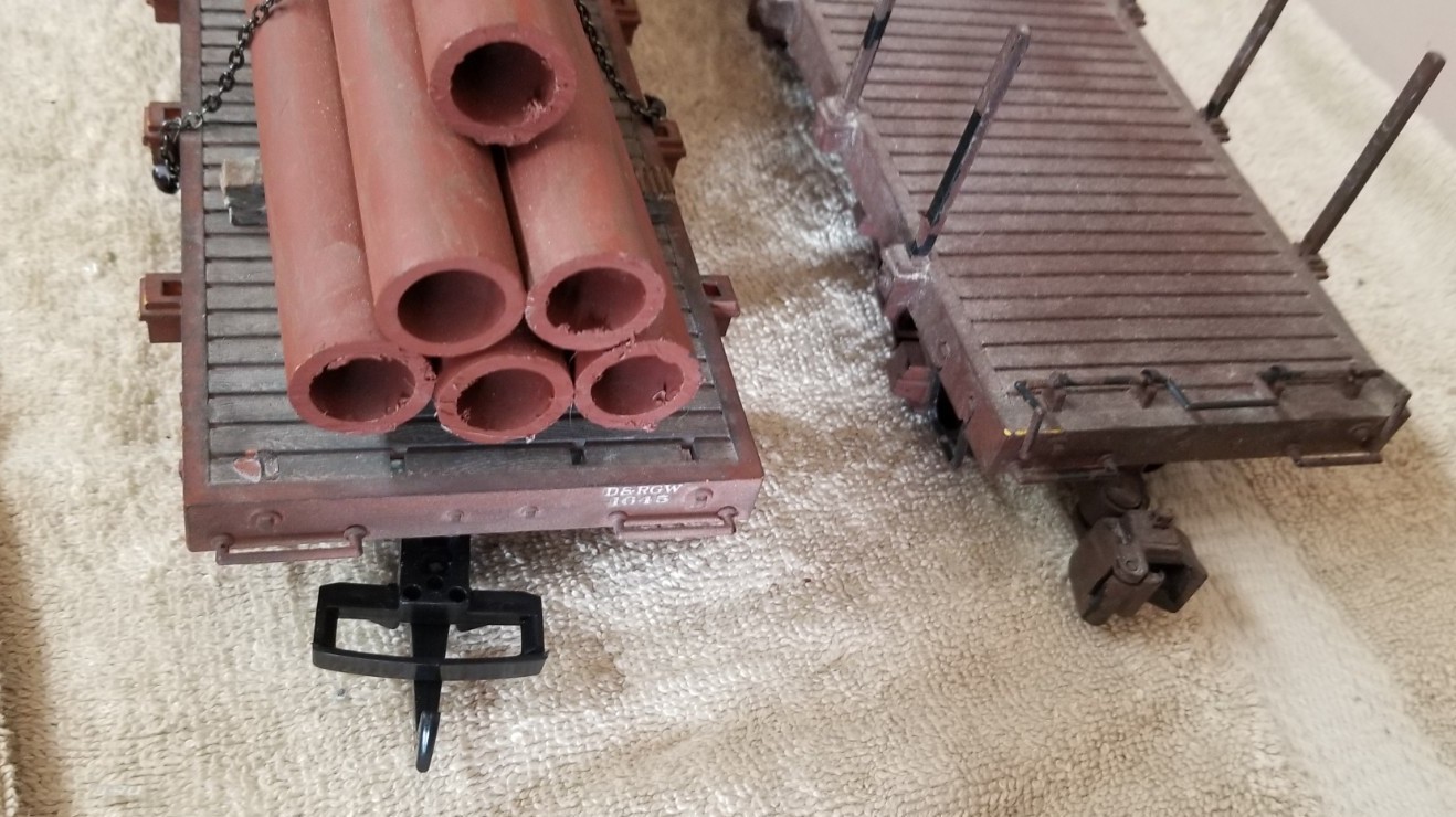 Set of 2 - Custom Flat Cars, one has Pipe load, both have Plastic ...