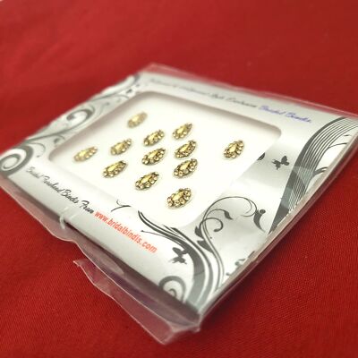 Exotic Eye-Catching Golden Face Embellishment Crystals | eBay