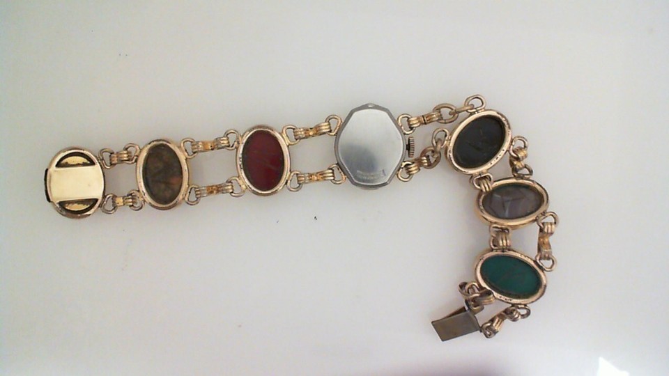 OLD ADMARK WOMEN'S 10K GOLD FILLED WRIST WATCH WITH SCARABS....IT WORKS ...