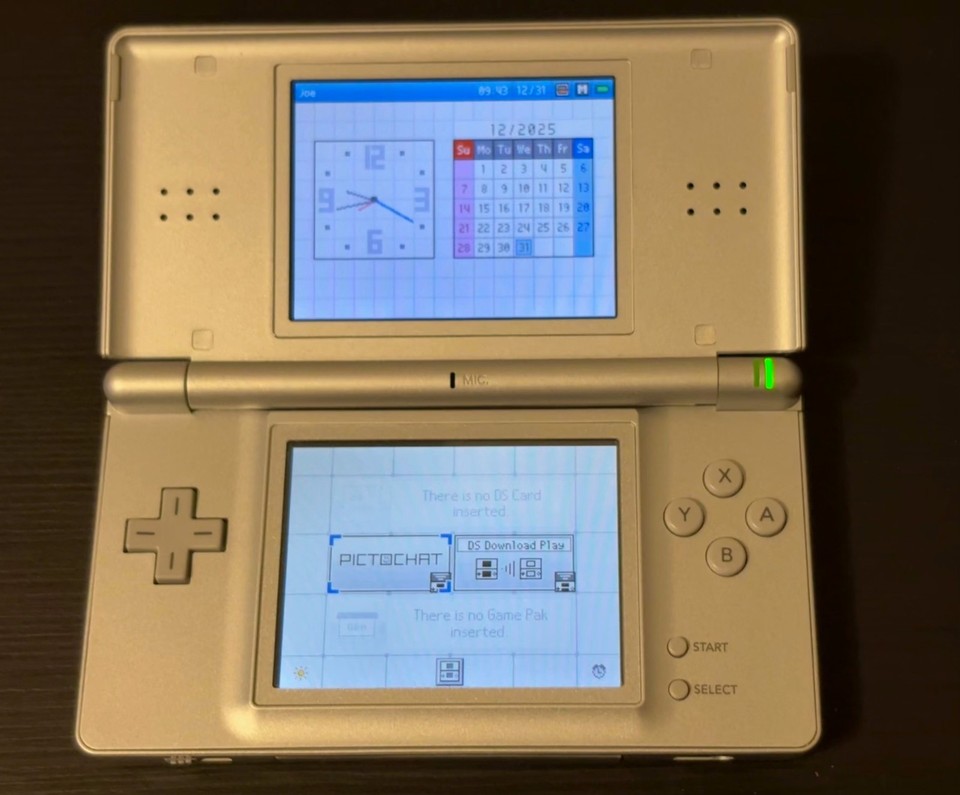 Nintendo DS Lite Silver with 9 Games, Charger, Carrying Case, and ...