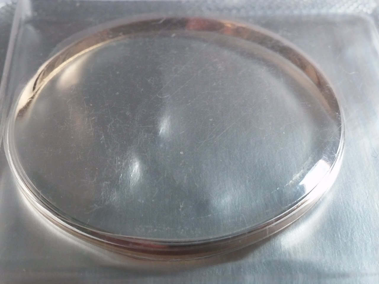 Genuine Omega watch crystal 31.60 x 3.5mm with gold-colored tension ...