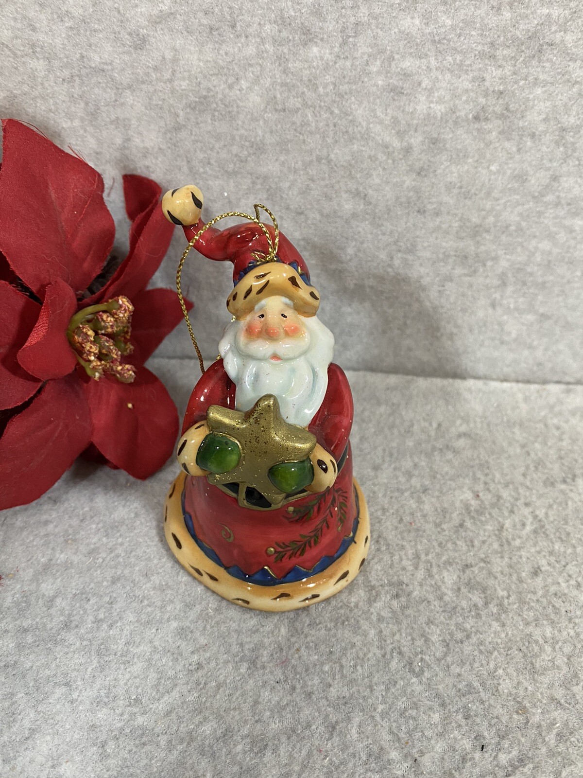 SANTA HOLDING STAR CHRISTMAS ORNAMENT BELL WITH THE FEET AS THE RINGER ...