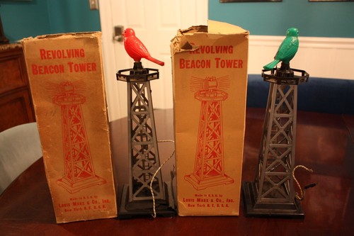 VINTAGE PAIR OF MARX REVOLVING BEACON TOWERS WITH RED & GREEN BIRD ...