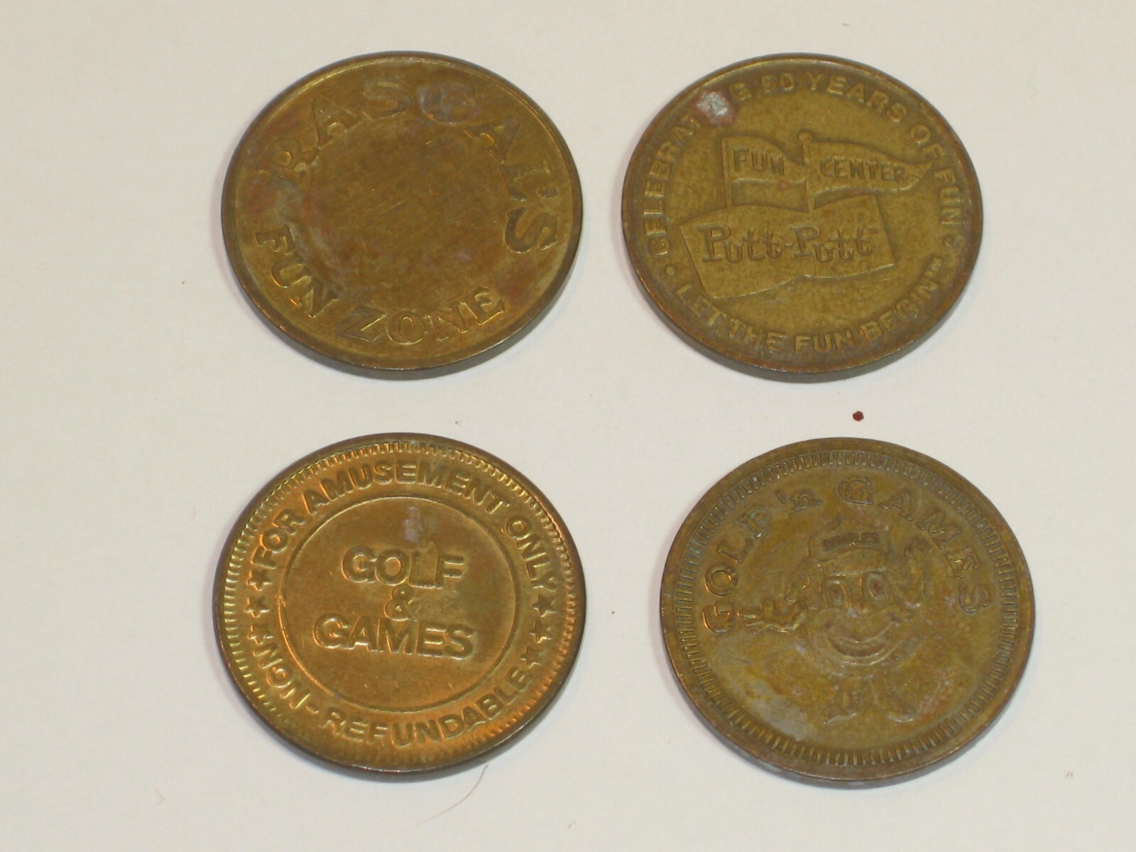 4 vintage arcade gaming token mix coin coins tokens lot Golf Games Putt ...