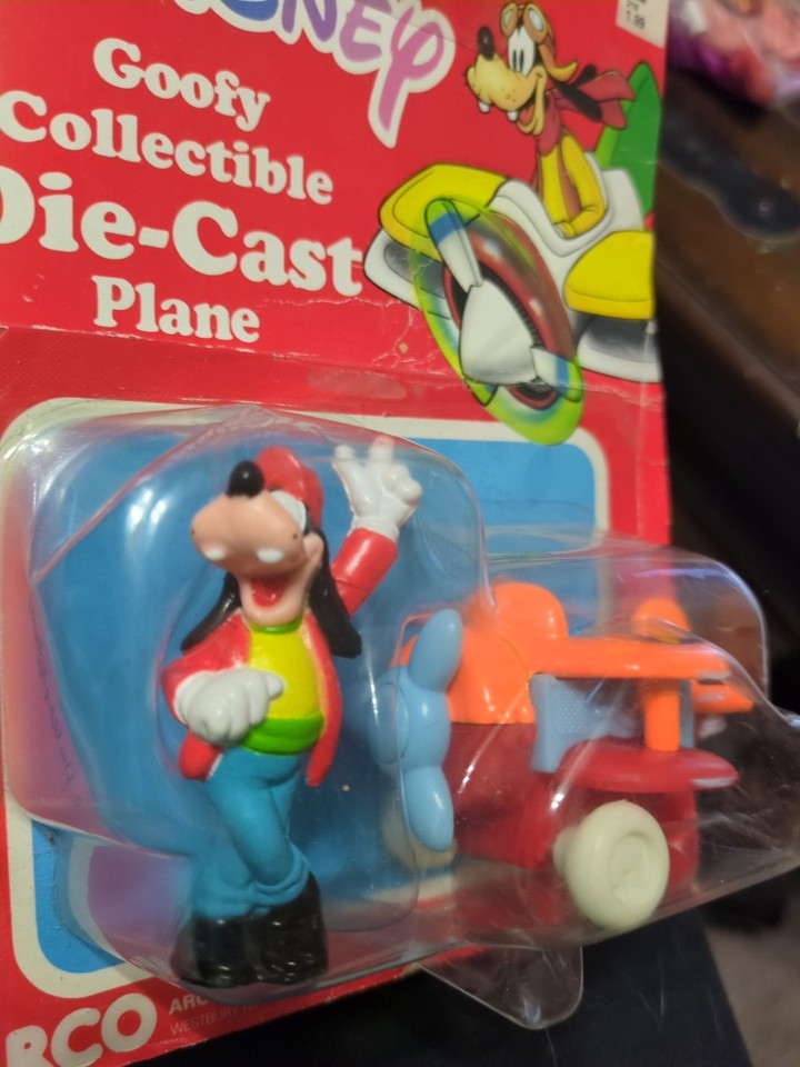 Disney Goofy collectible die cast plane green in original package | eBay