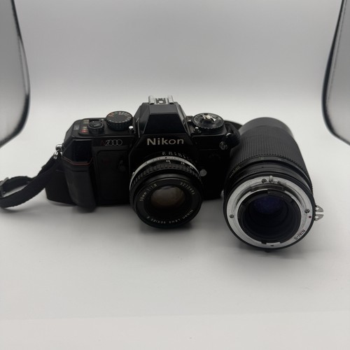 Nikon N2000 35mm SLR Camera with 2 Lenses Untested | eBay
