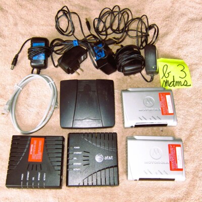 Lot of 5 DSL modems and power supplies | eBay