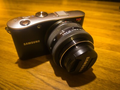 Samsung NX100 Mirrorless DSLR Camera With 20-50mm Lens, Battery ...