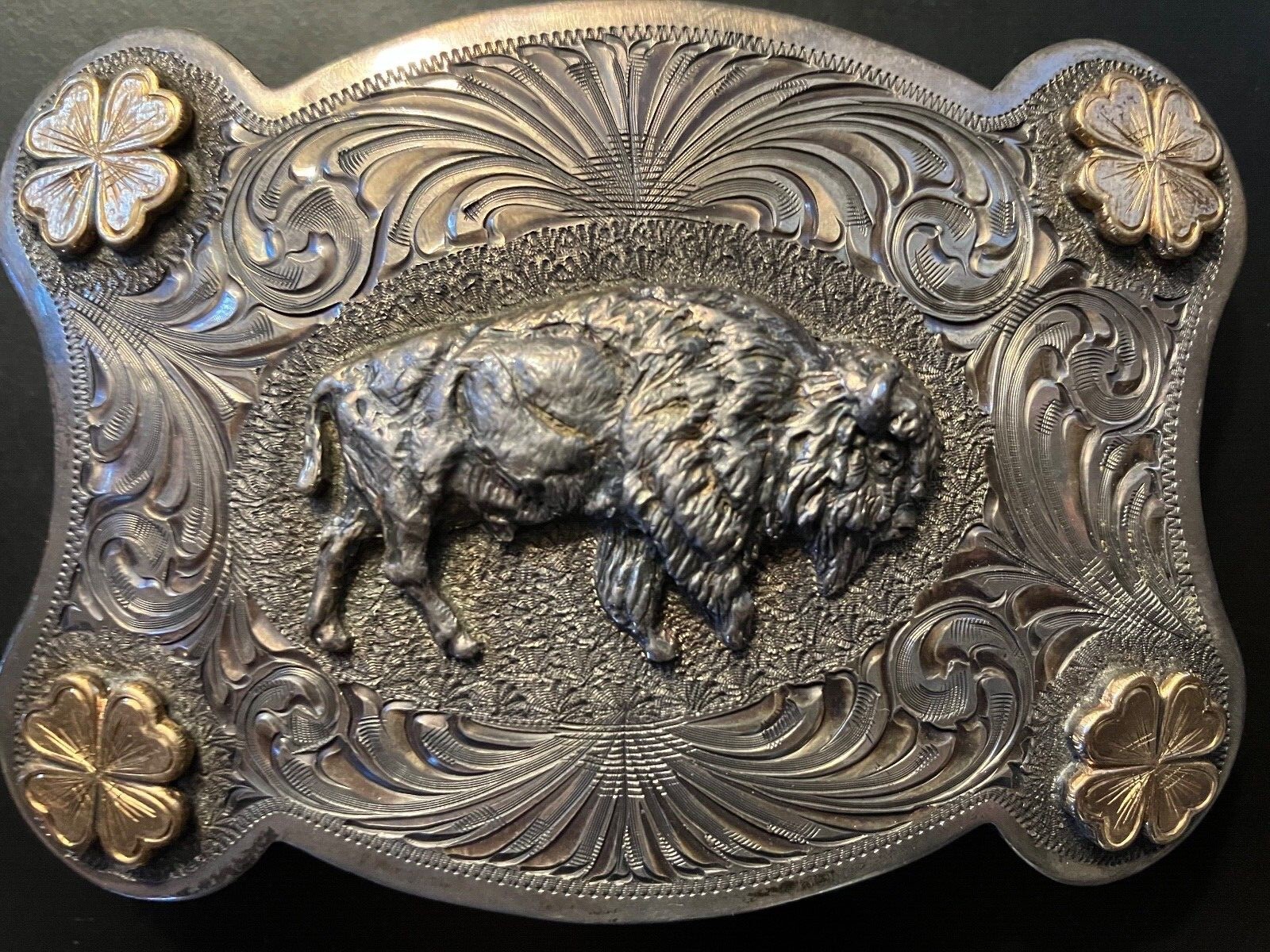 Clint Orms scalloped trophy buckle 14kt flower edges buffalo center | eBay