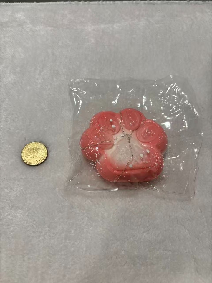 squishy toy squeeze toy stress toy pink cat paw with silver chain and ...