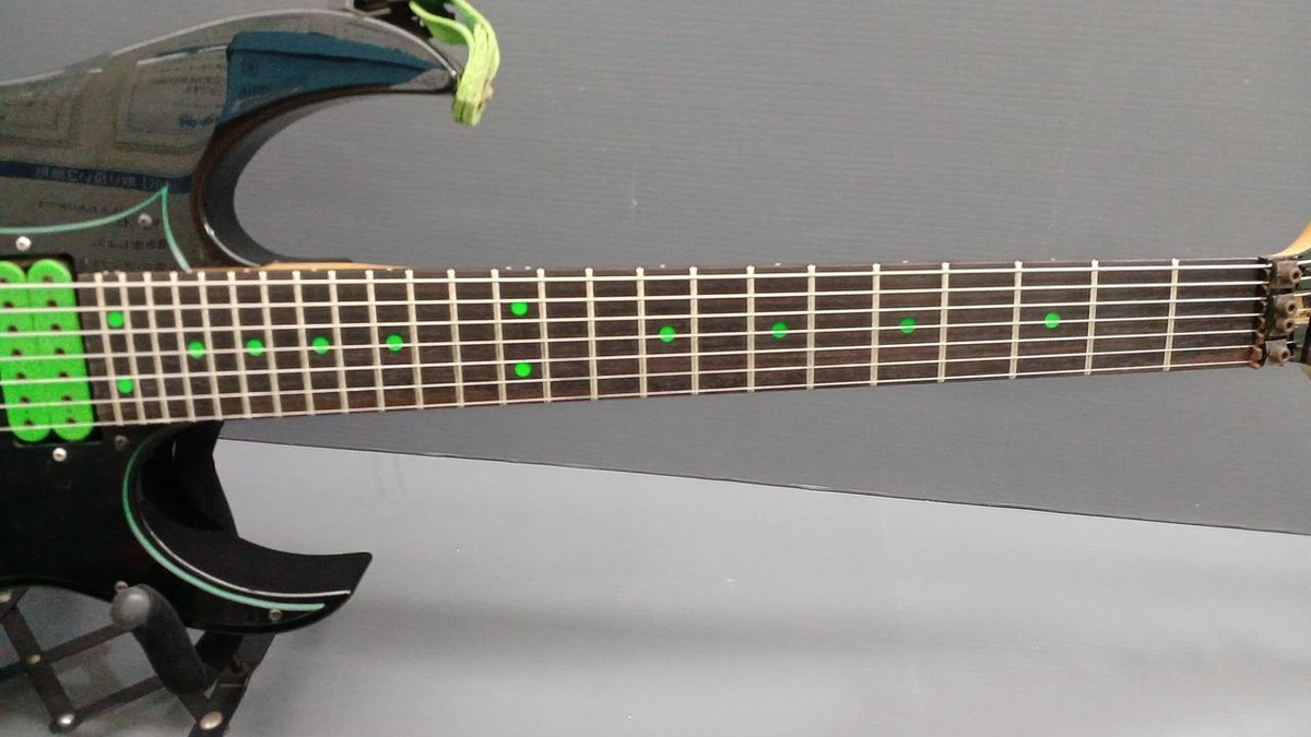 Vintage 1990s Ibanez UV7 Electric Guitar With Armbar Strap Vintage 1990s Ibanez UV7 Electric Guitar With Armbar Strap