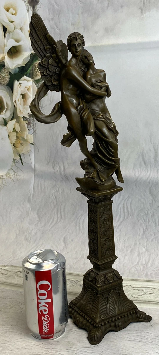 Sculpture De Cupidon