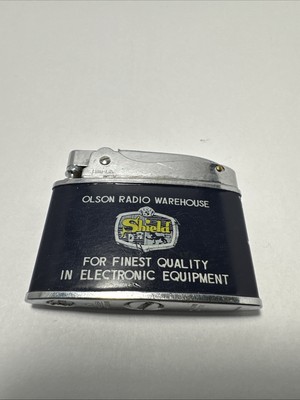 Omega Flathead Lighter Olsen Radio Warehouse Logo | eBay
