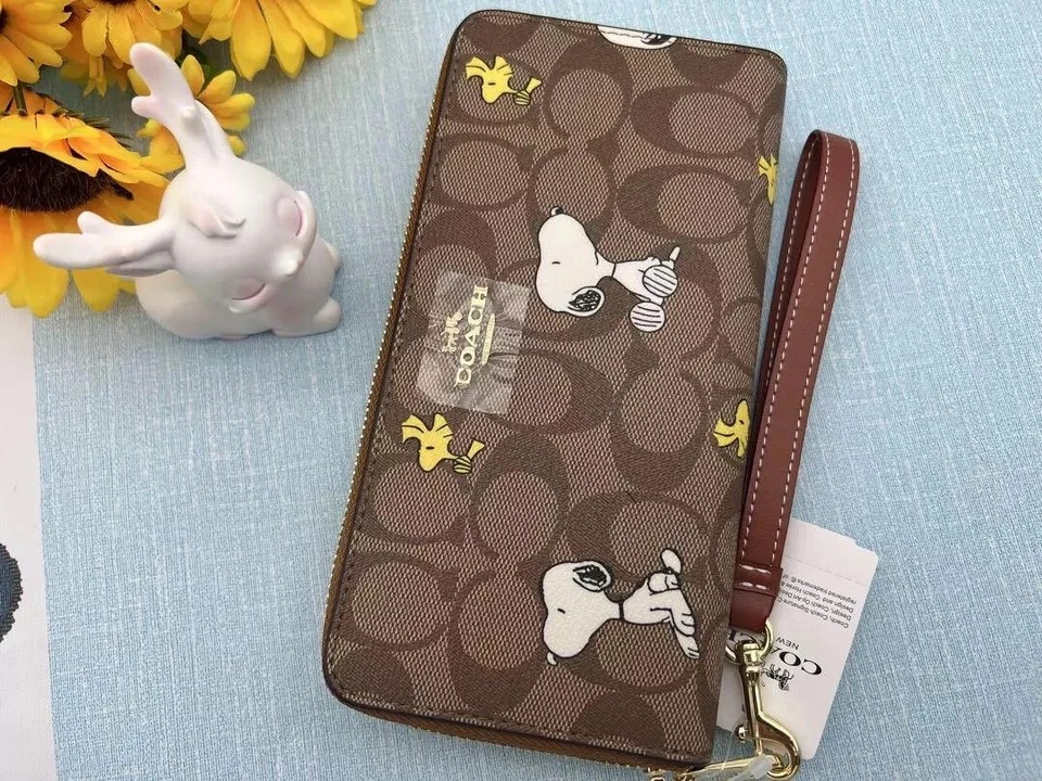 COACH x PEANUTS Long Zip around Wallet Snoopy Woodstock Khaki Signature ...