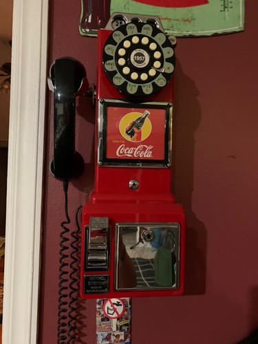 Working landline retro-style Coca-Cola payphone, a replica of a 1957 ...