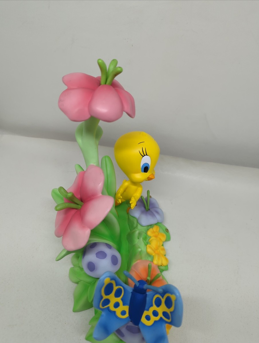 Tweety Bird Holding A Flower