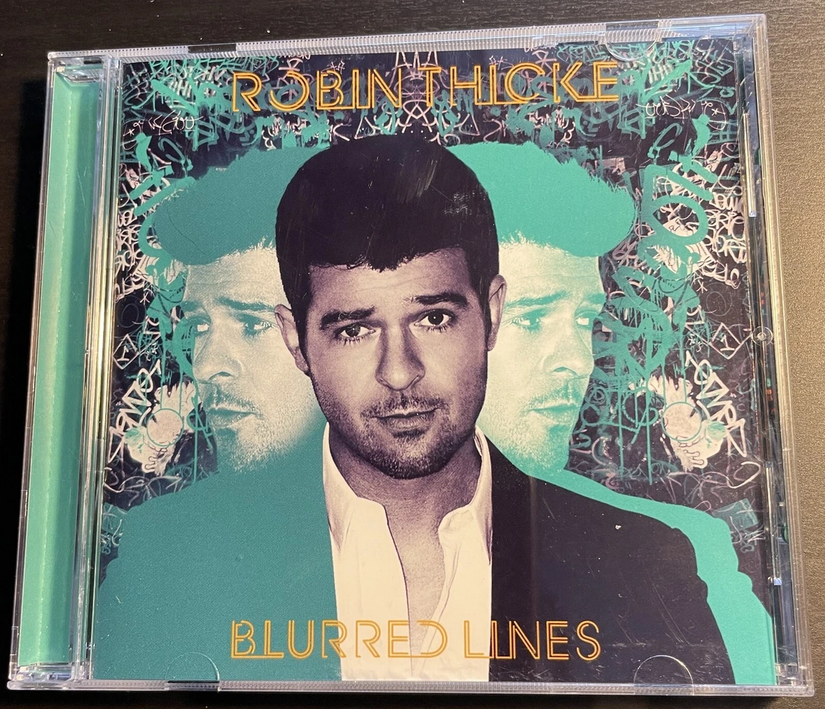 Robin Thicke Blurred Lines Deluxe Album Cover