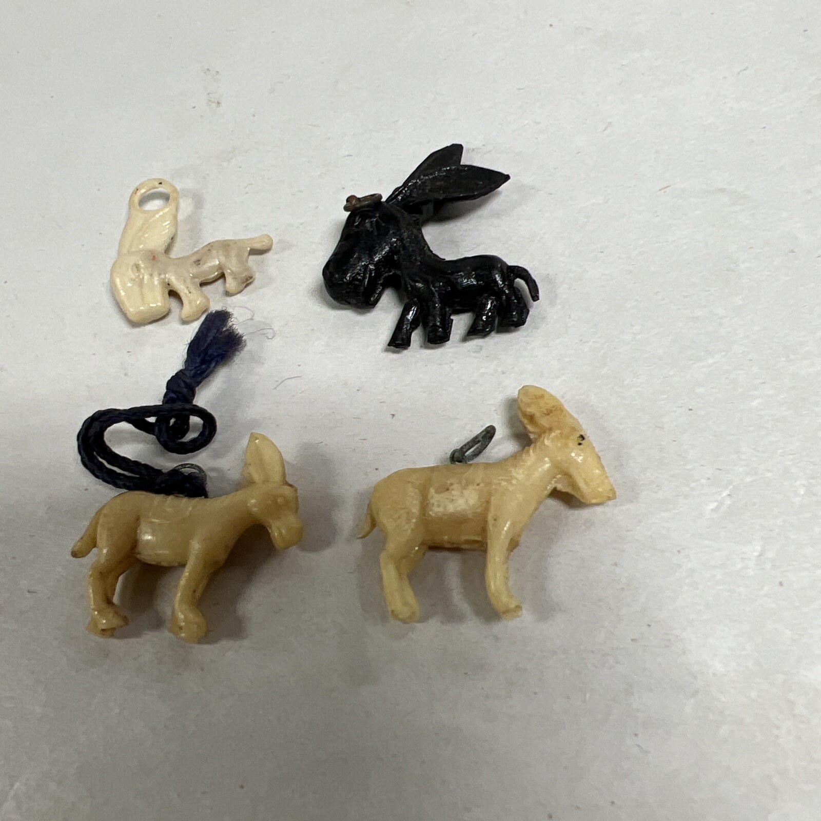 LOT OF 4 VINTAGE CELLULOID VARIOUS DONKEY MULE CHARMS CRACKER JACK TOY ...