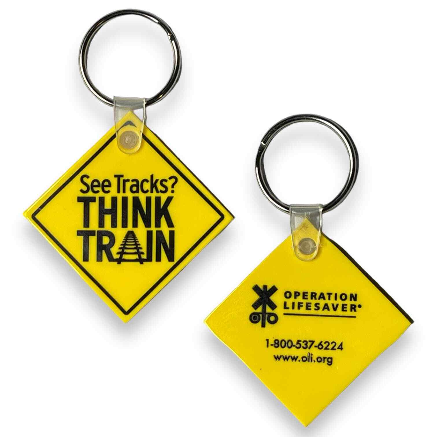 See Tracks? THINK TRAINS Rubber Keychain with Ring op… - Gem