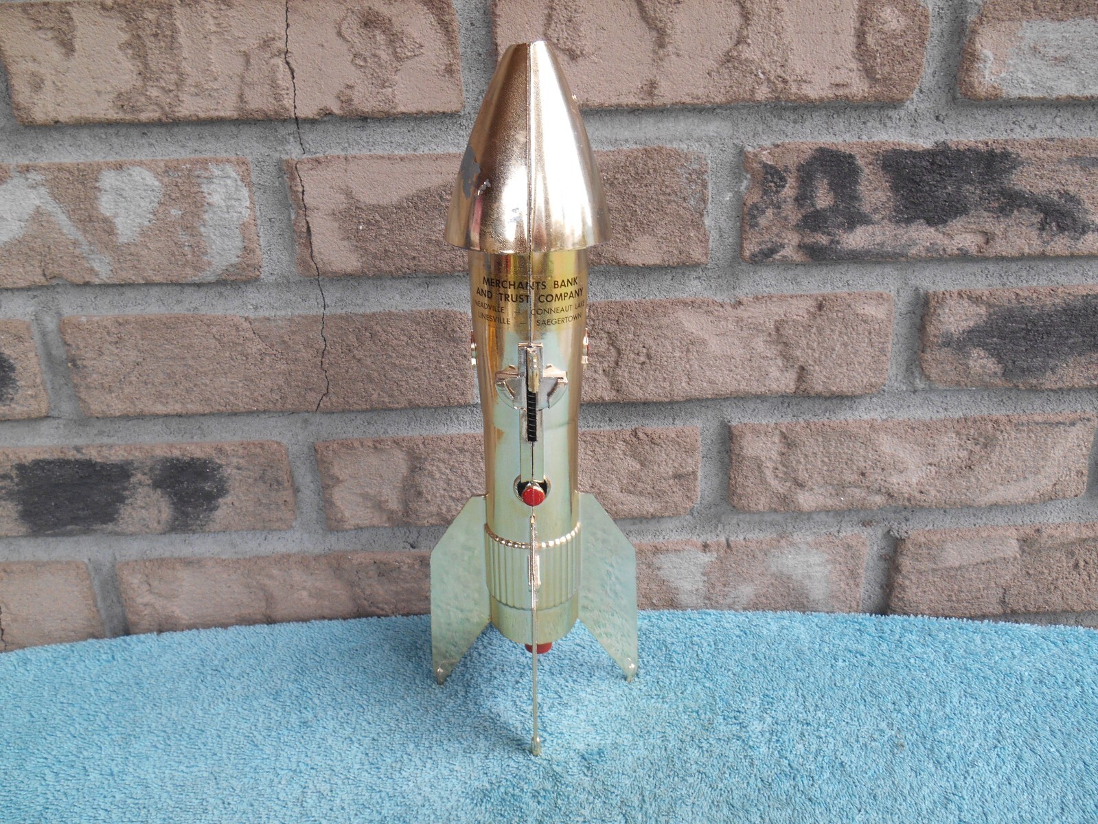 VINTAGE ASTRO MFG. DIE CAST ROCKET SHIP MECHANICAL COIN BANK MERCHANTS ...