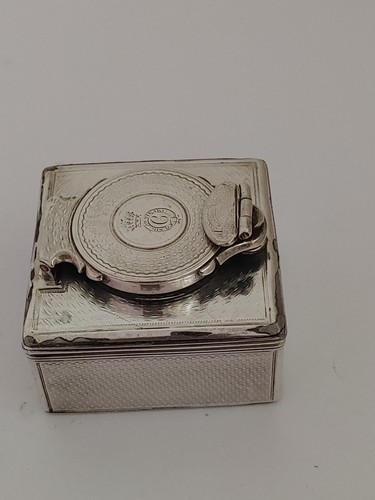 An unique sterling silver Georgian engine turned portable inkwell with ...