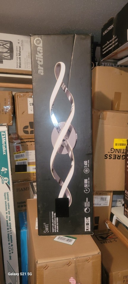 Artika Swirl 27 in. 1-Light Matte Black Modern Integrated LED Vanity ...