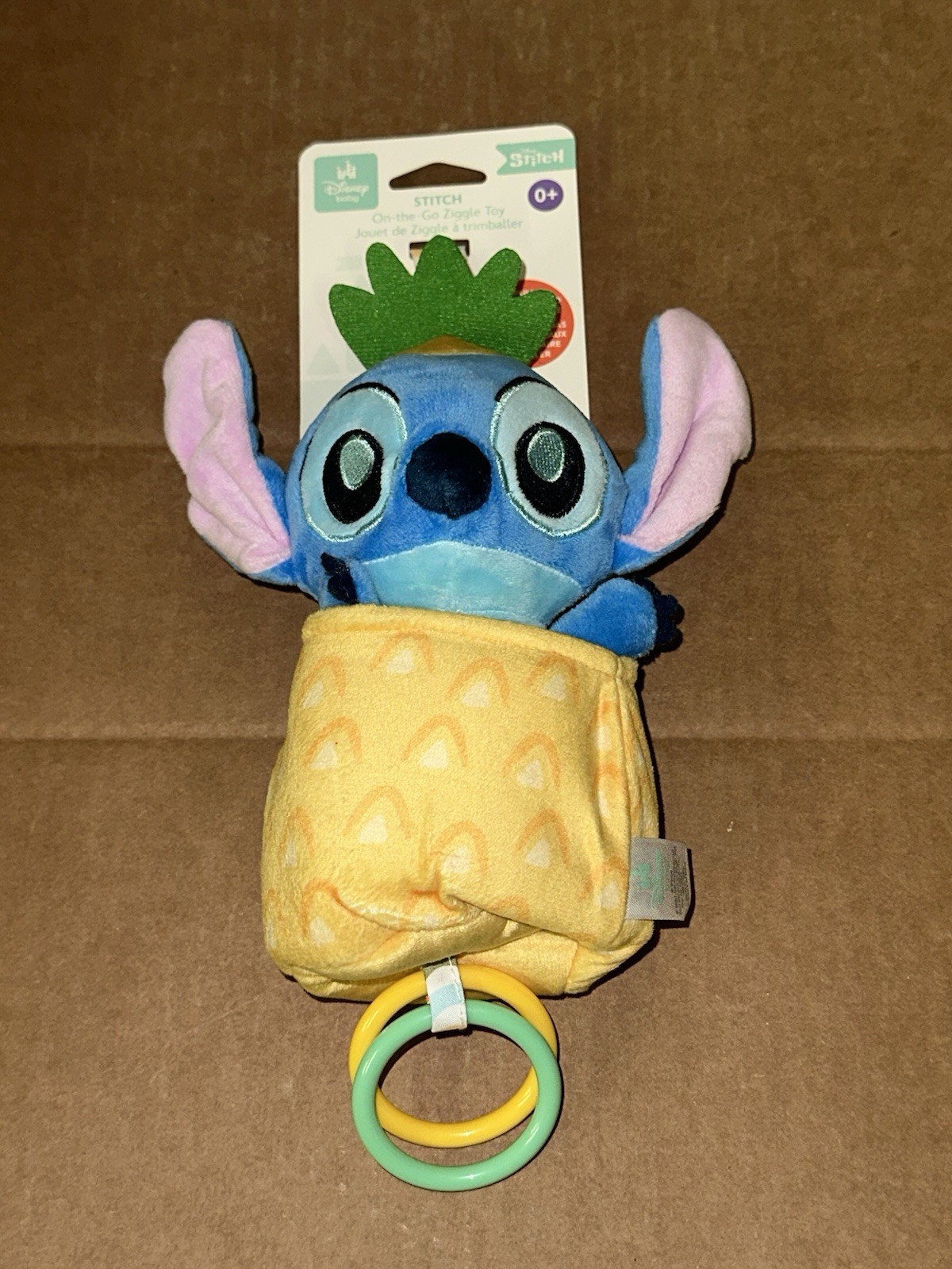 Disney Baby Stitch On The Go Ziggle Infant Toy Pineapple Crib Stroller ...