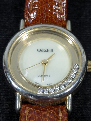 Watch-it Nelsonic MOP Dail Floating Crystal Round Case Brown Leather ...