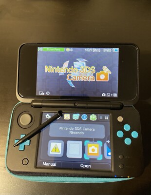Great condition New 2ds XL with accessories, charger, and 4gb sd card ...