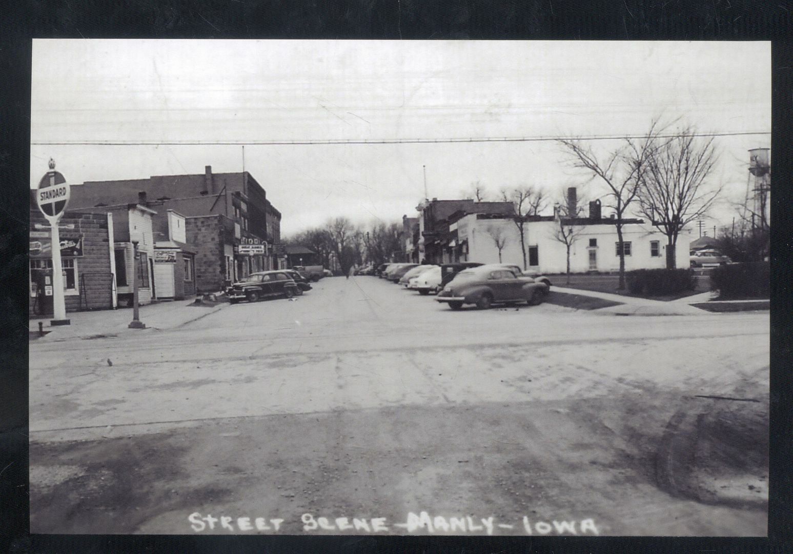 REAL PHOTO MANLY IOWA DOWNTOWN STREET SCENE 1940's CARS POSTCARD COPY ...