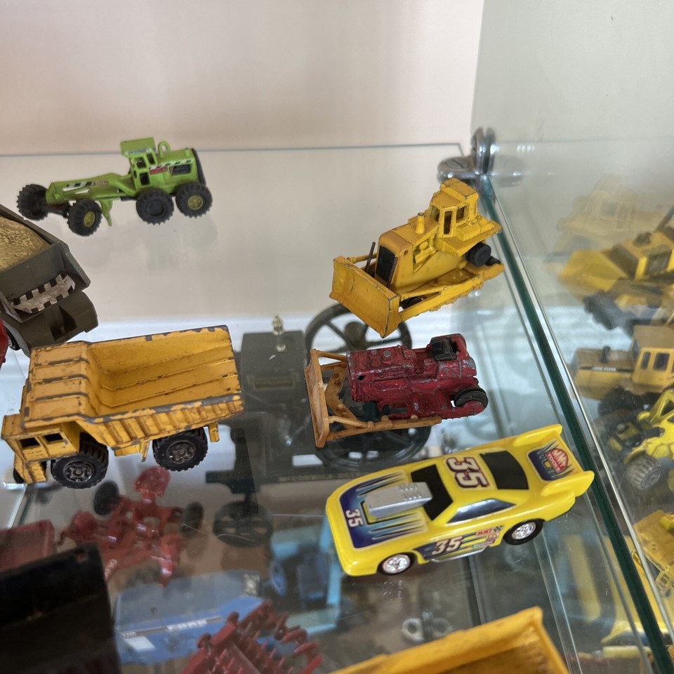 A mixed lot of Hot Wheels, Ertl, Matchbox and more | eBay