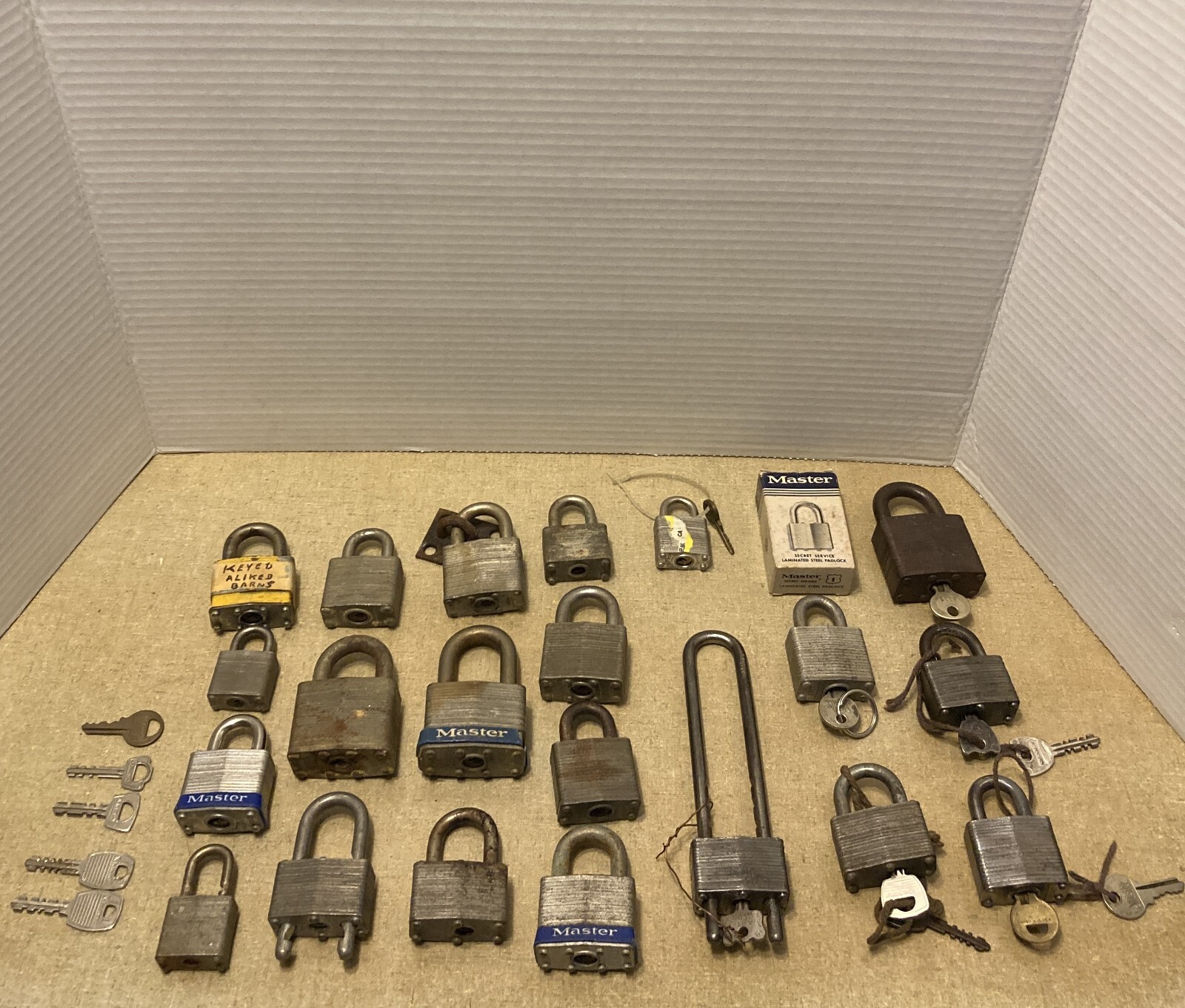 Lot of 21 Vintage Master Lock Co. Padlocks Some with Keys, 1 box, 5 odd ...