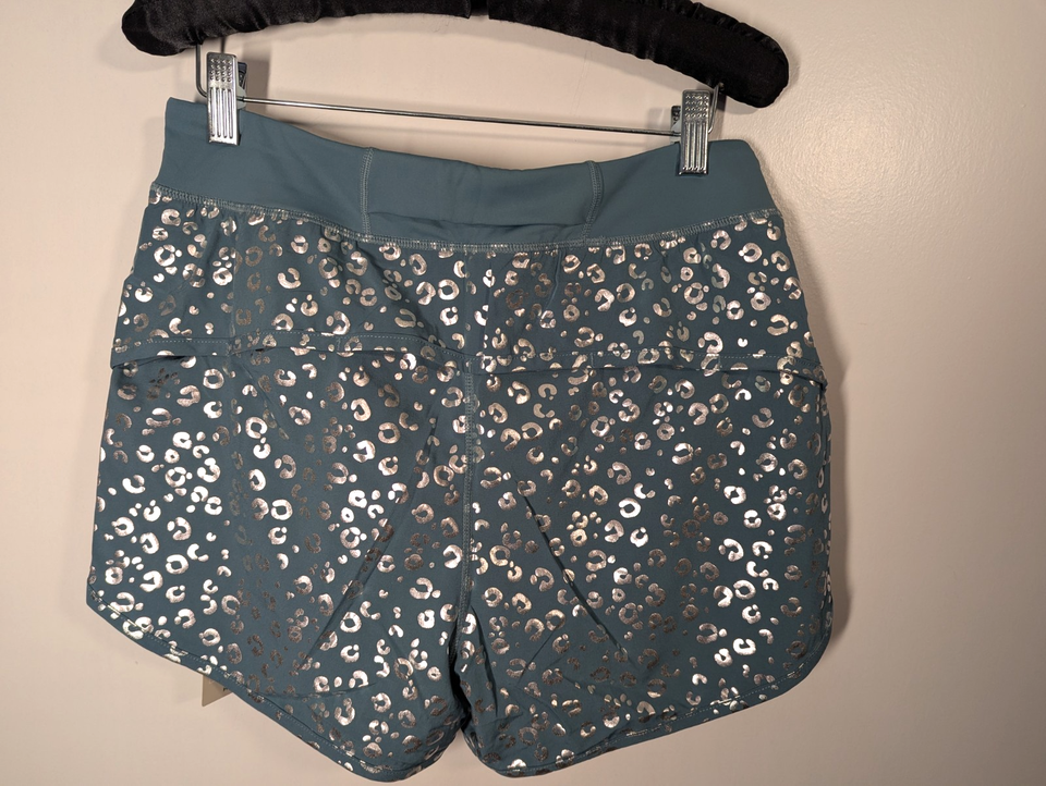 Halara Size Medium Reflective Curved Hem 2 in 1 Lepard Teal Print Yoga ...