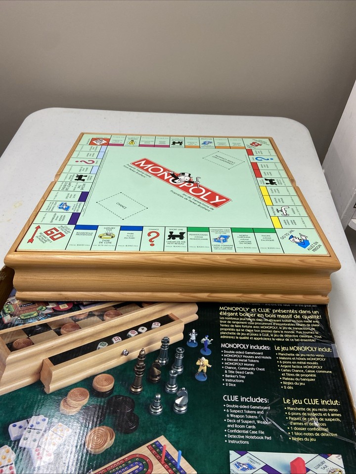 Monopoly Clue Chess Checkers Dominoes + 3 Games in Wood Cabinet w ...