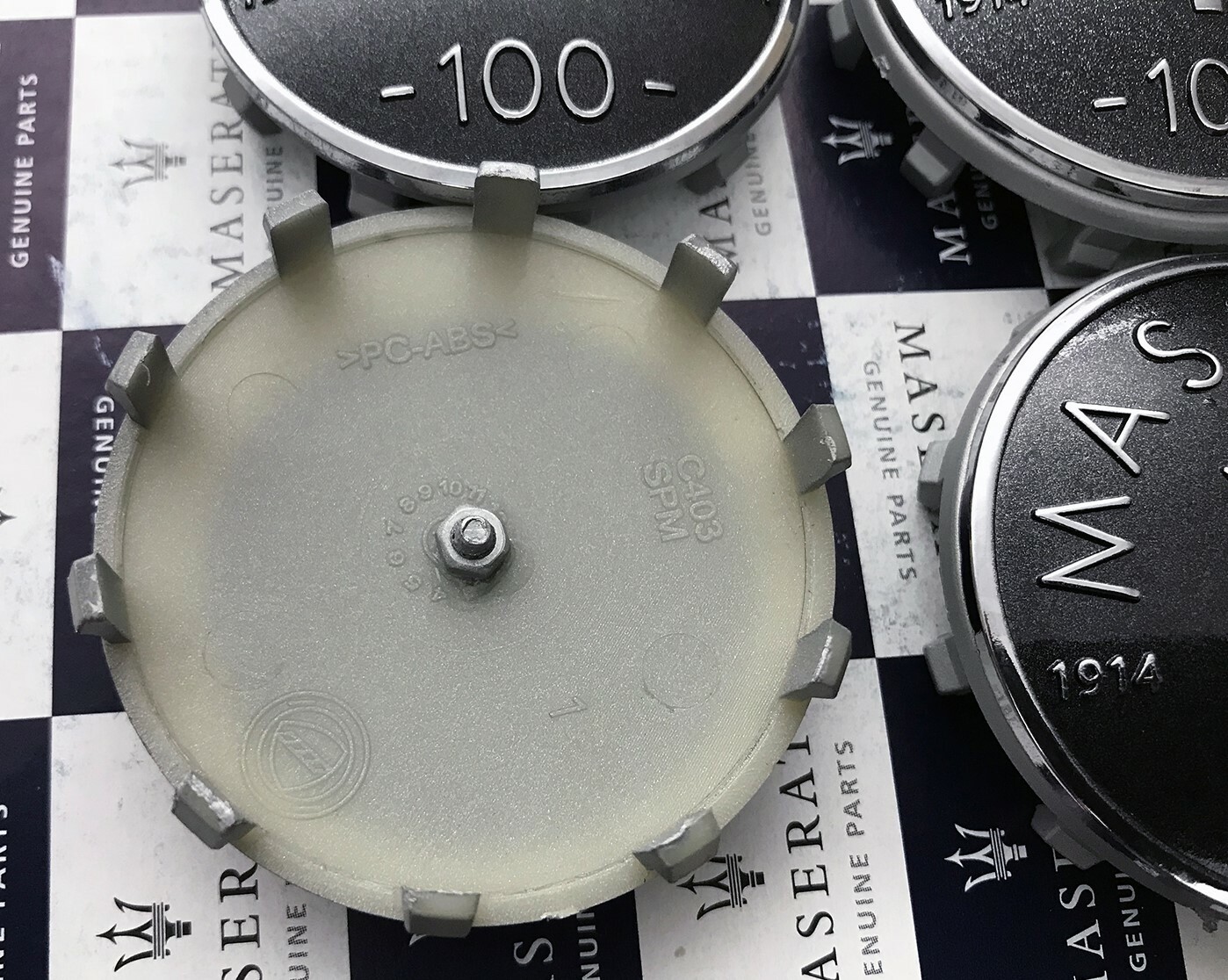 1914-2014 MASERATI "100" WHEEL CENTER CAPS 58mm NEW SET OF 4 | eBay