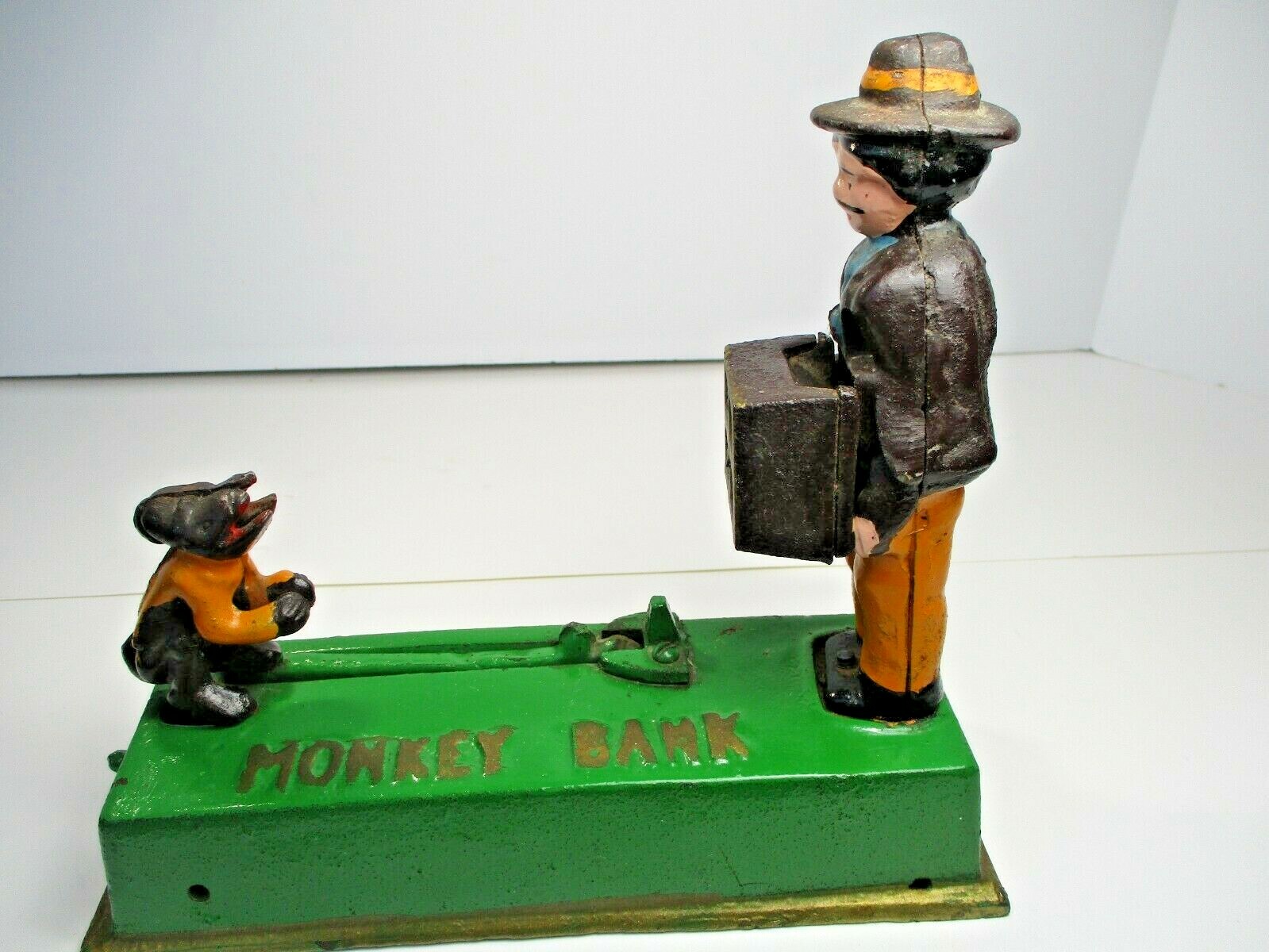VINTAGE CAST IRON MONKEY BANK | eBay