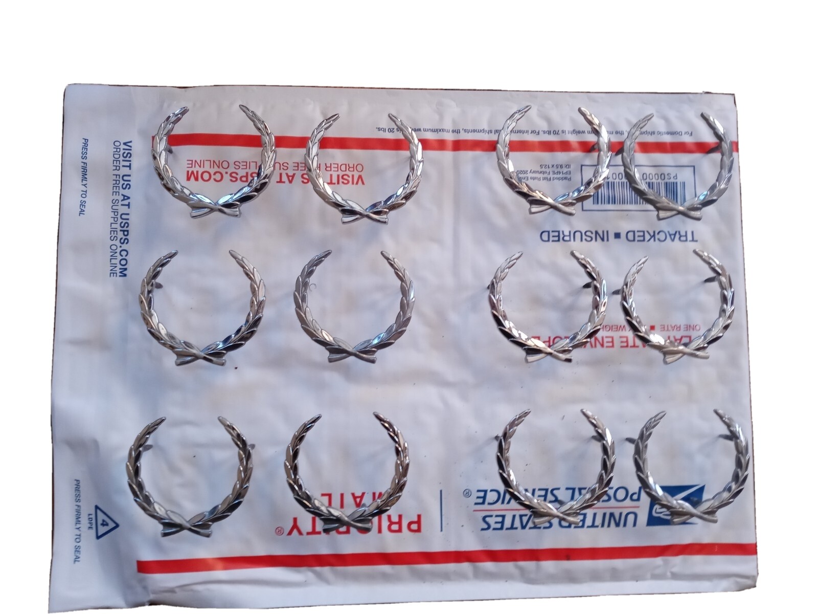 1990-1992 Cadillac Brougham Vinyl Top Sail Panel Emblems | Genuine OEM