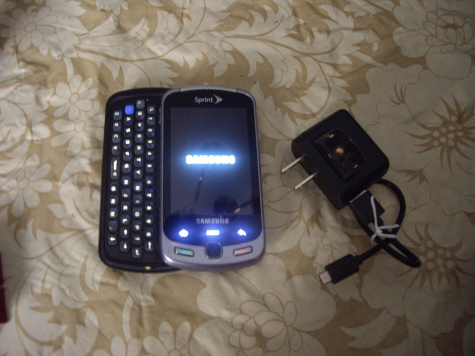 Samsung Moment with camera and charging cables. Working | eBay