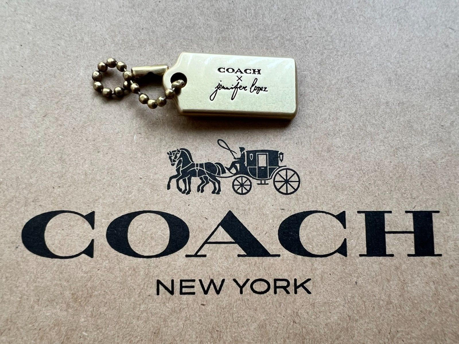 COACH Logo New York Jennifer Lopez Metal 1" Hang Tag … - Gem