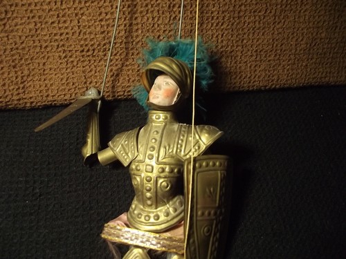 A VINTAGE BRASS HAND PAINTED MEDIEVAL KNIGHT PUPPET WITH SHIELD AND ...