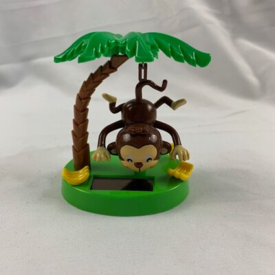 Solar Powered Monkey hanging from a Palm Tree that Swings, swinging ...