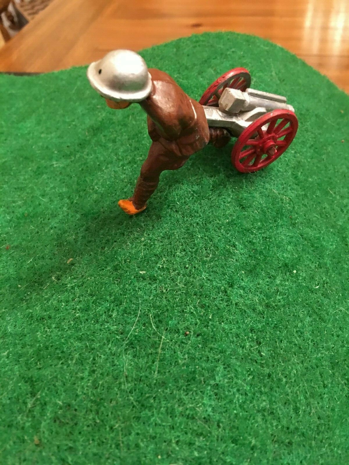 SOLDIER PULLING CANNON WITH METAL WHEELS; "MINTY CONDITION" SAME DAY ...