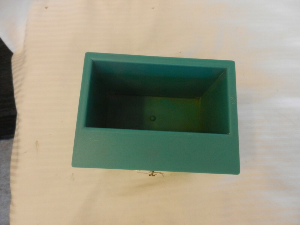 Green Plastic Flower Planter With Southwestern Colored Quartz Clock ...