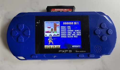 PXP 3 Slim Handheld Game With 2 Games | eBay
