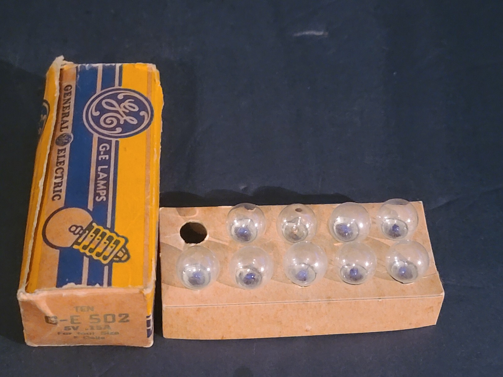 (BOX of 9) ORIGINAL OEM GENUINE GE 502 Bulbs 5V Volt .15A Amp for F ...