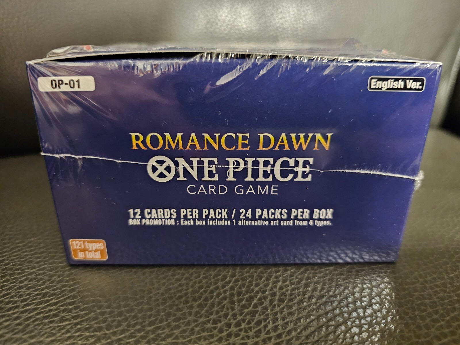 One Piece OP01 Romance Dawn Booster Box anglais - fendu dans un joint ...