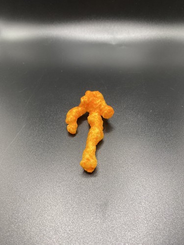 Crunchy Cheeto shaped like a ship’s Anchor or Arrow. | eBay