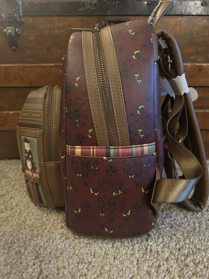Disney Haunted Mansion Stretching Room Portraits Glow Mini Backpack ...