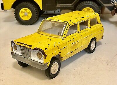 Vintage 1960's Tonka Jeep Wagoneer Yellow, Original Press Vintage 1960's Tonka Jeep Wagoneer Yellow, Original Press