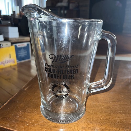 Miller Genuine Draft Heavy Glass Beer Pitcher. There is a chip on the ...